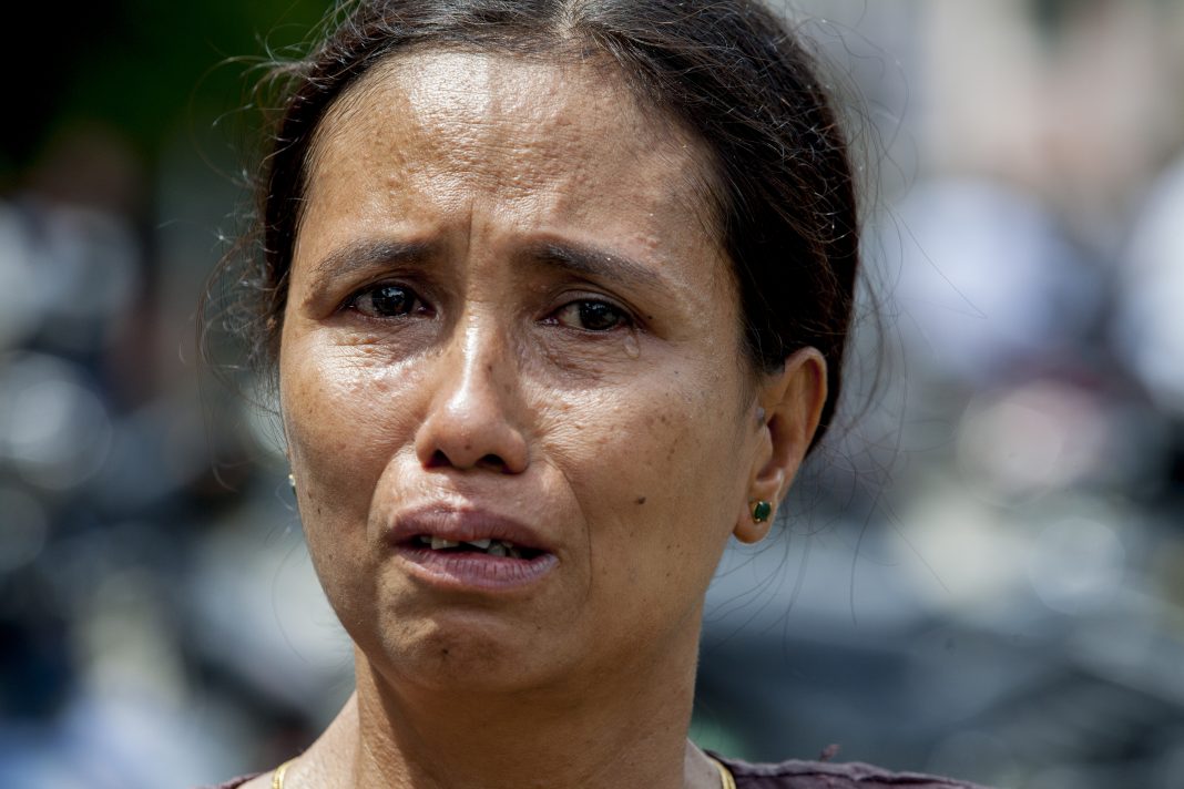 Photo of the Week: A woman in tears, after having lost all her ...
